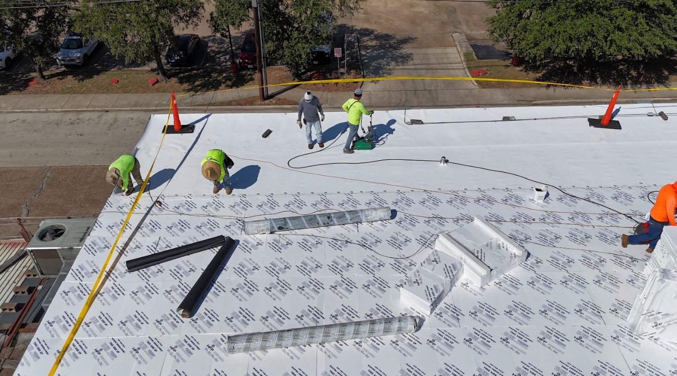 Roof Coatings for Houston Commercial Buildings | Compass Roofing TX